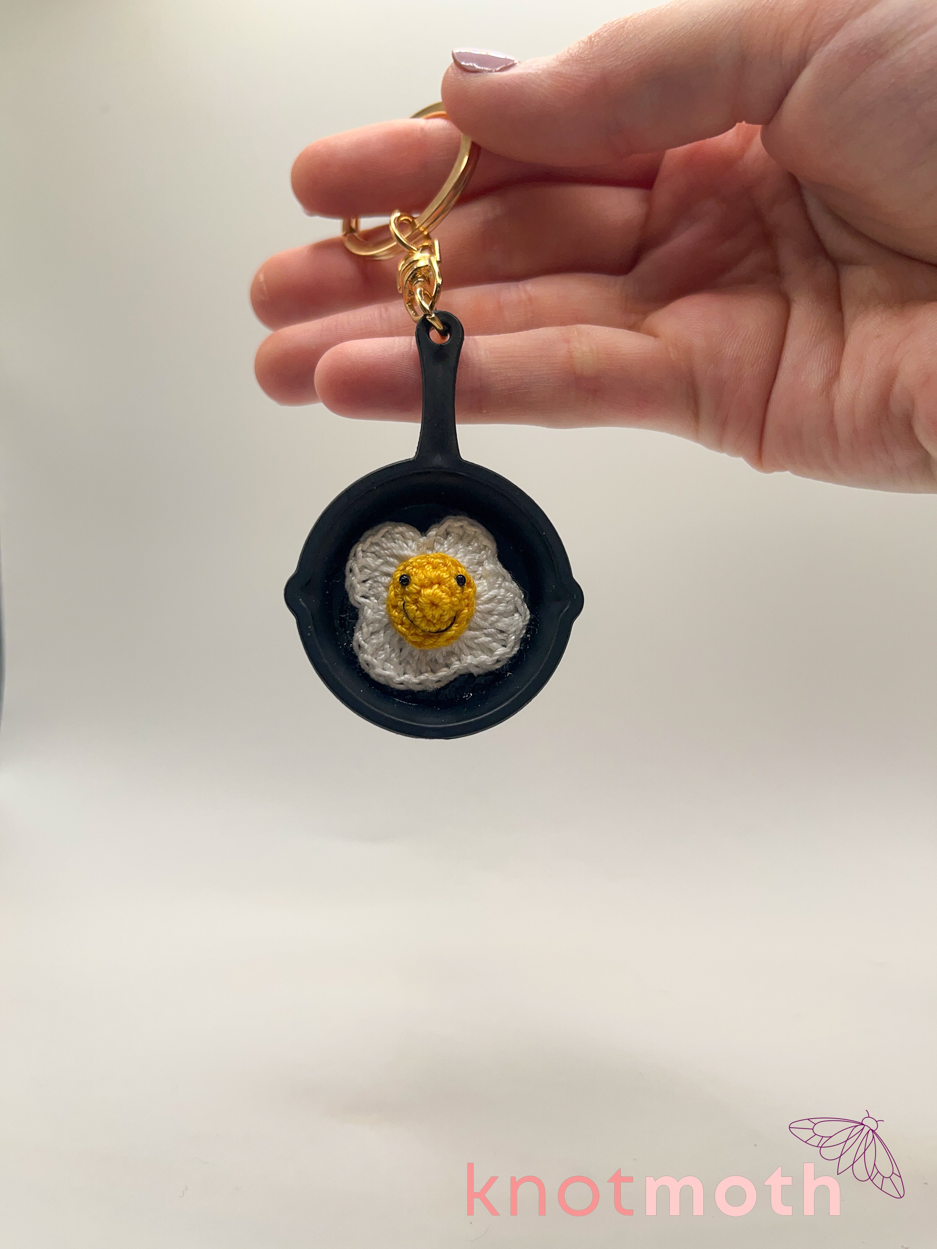 fried egg skillet micro crochet keychain – knot moth